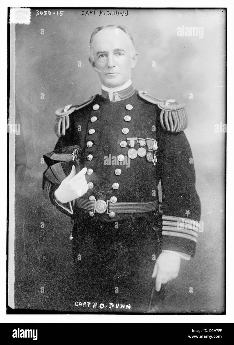 Captain H.O. Dunn of the U.S. Navy is pictured in military uniform ...