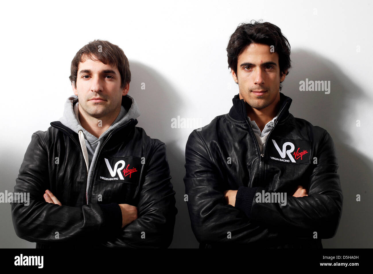 German Formula One driver Timo Glock (L) and Brazilian driver Lucas di ...