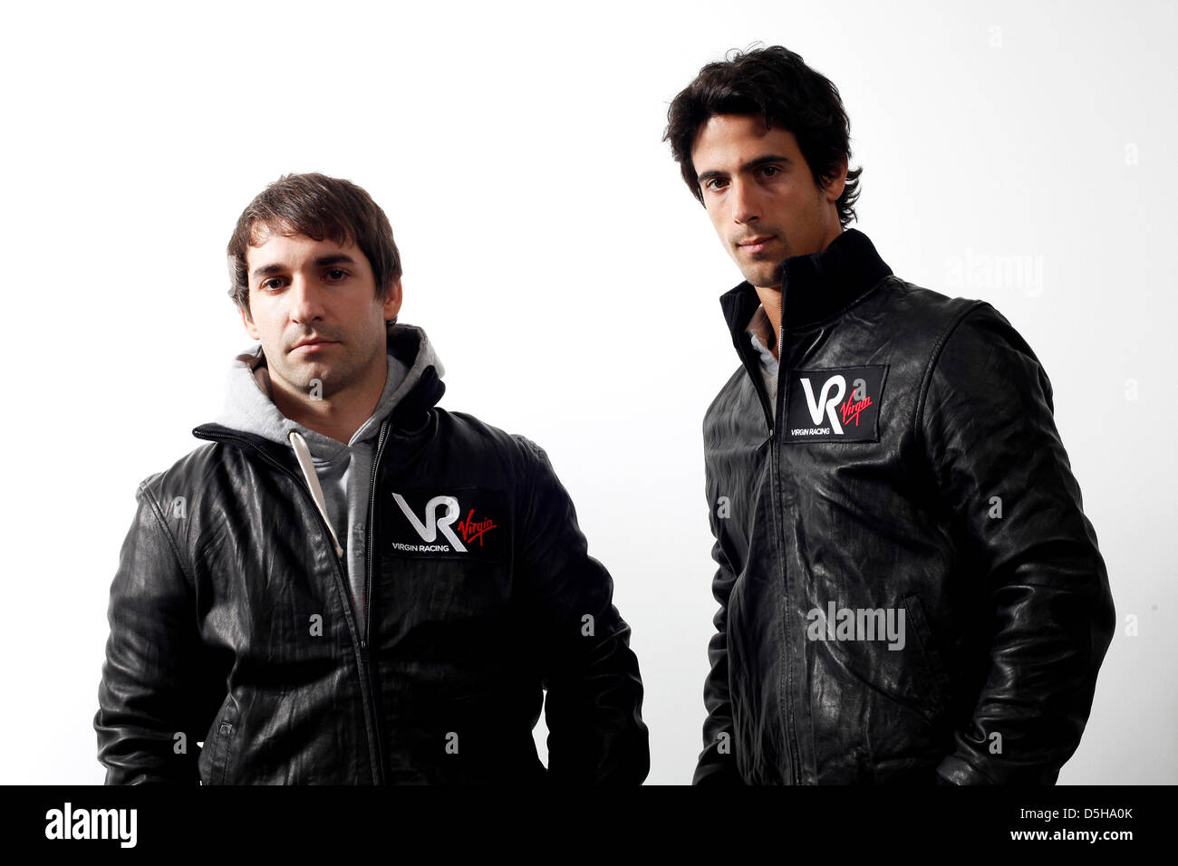 German Formula One driver Timo Glock (L) and Brazilian driver Lucas di ...