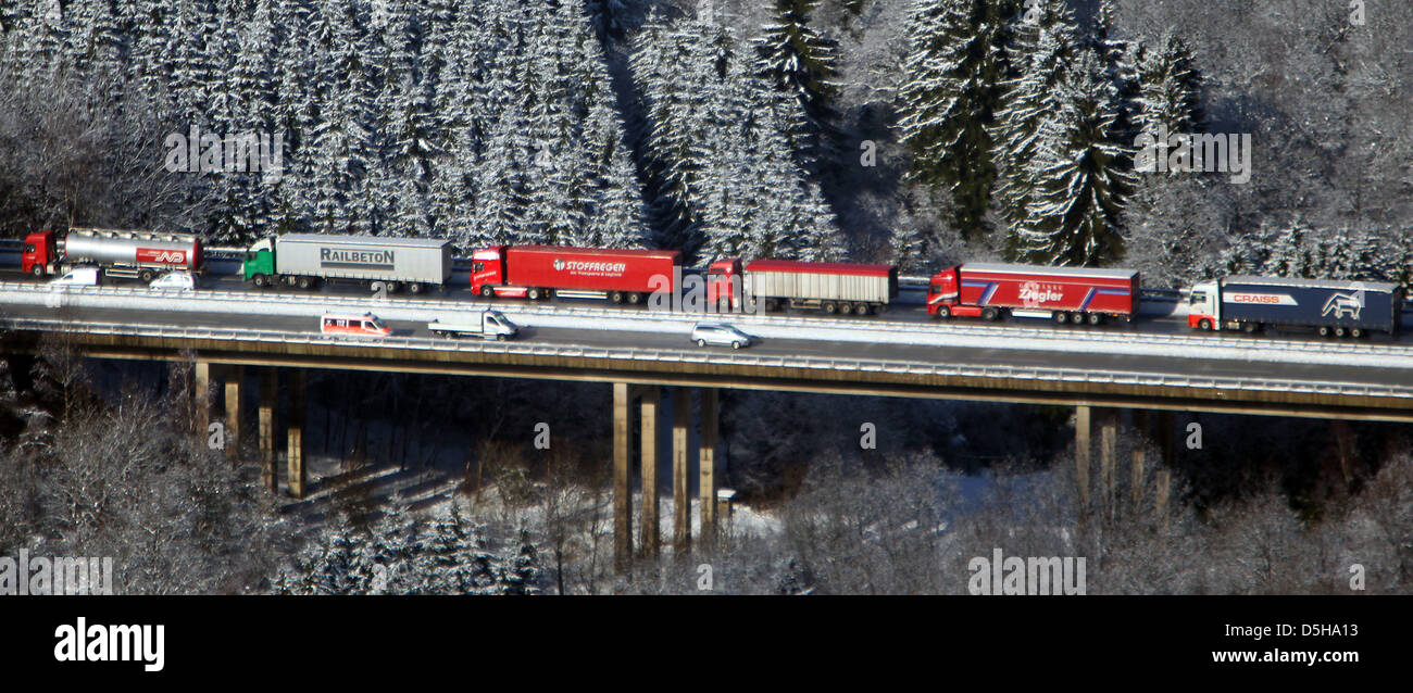 Aerial view of hundreds of lorries stuck in a traffic jam on motorway ...