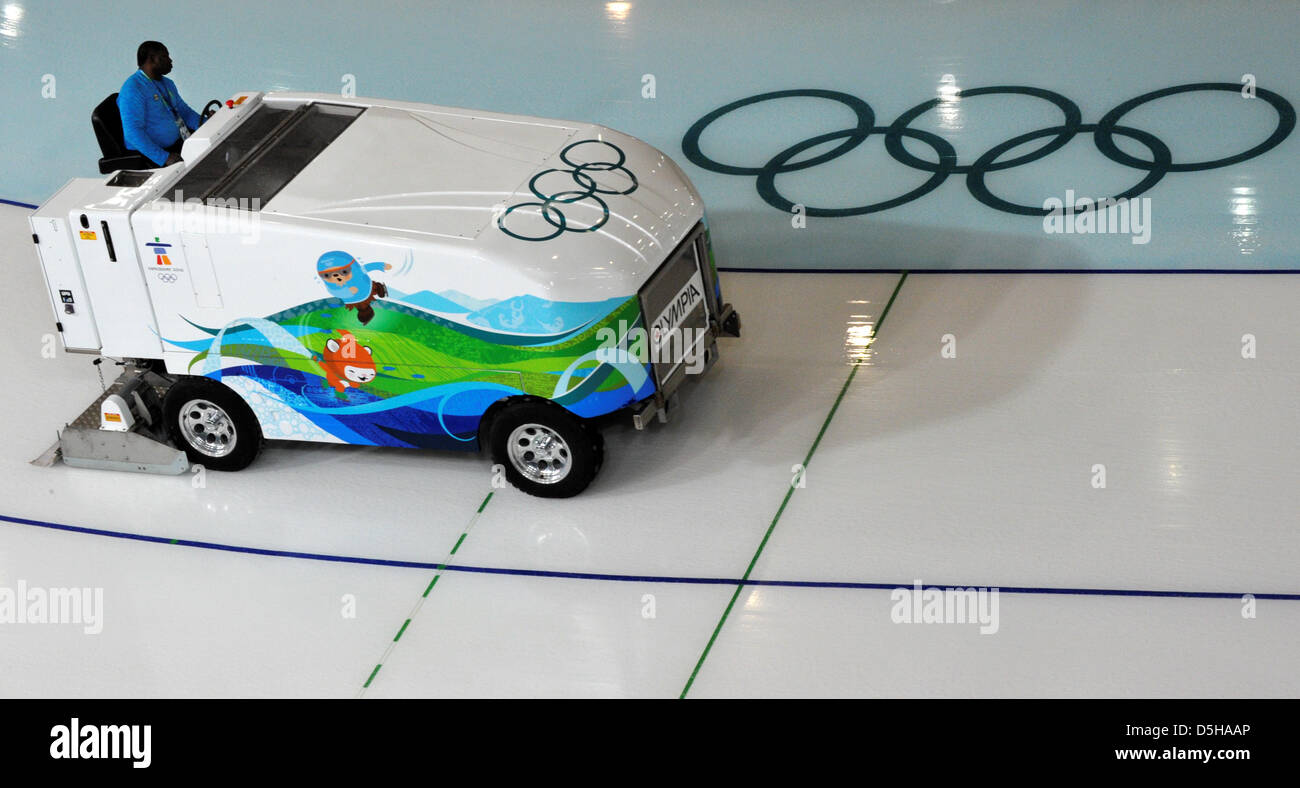 An ice surfacing machine prepares the track of Richmond Olympic Oval in ...