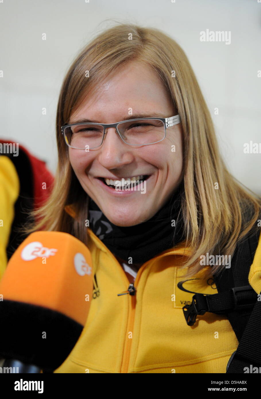German speed skater Jenny Wolf smiles as she is interviewed after her ...