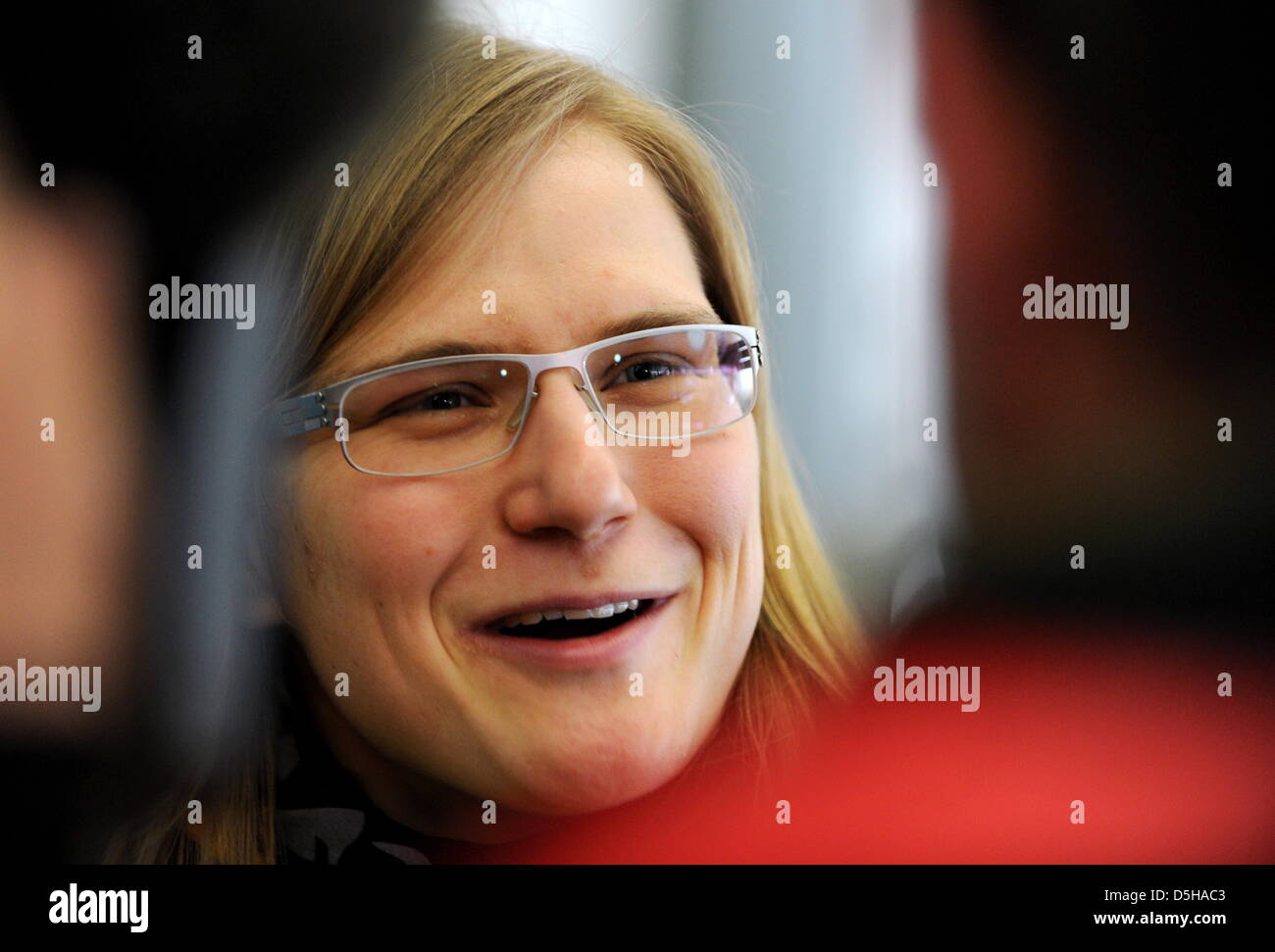 German speed skater Jenny Wolf smiles as she is interviewed after her ...