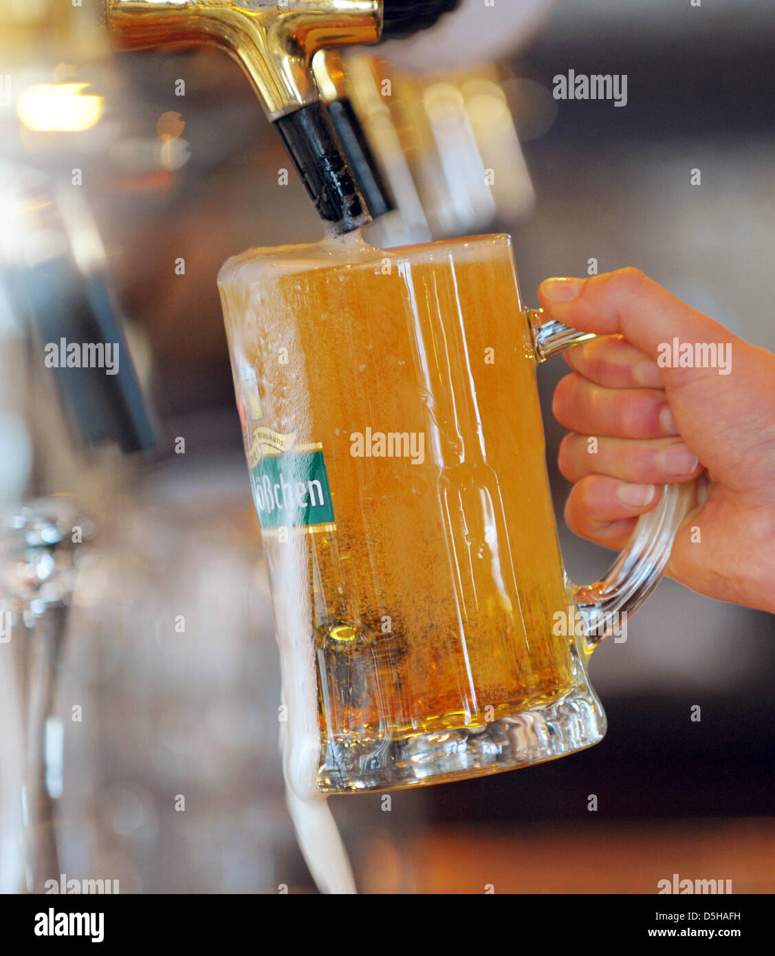 A beer is freshly draught at a press conference held by Saxon Beer ...