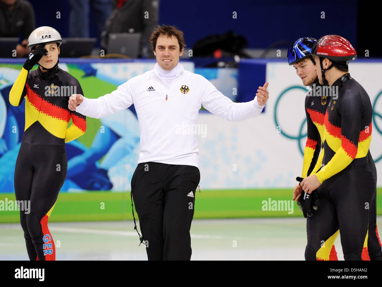 German coach Eric Bedard (C) talks to Aika Klein, Paul Herrmann and ...