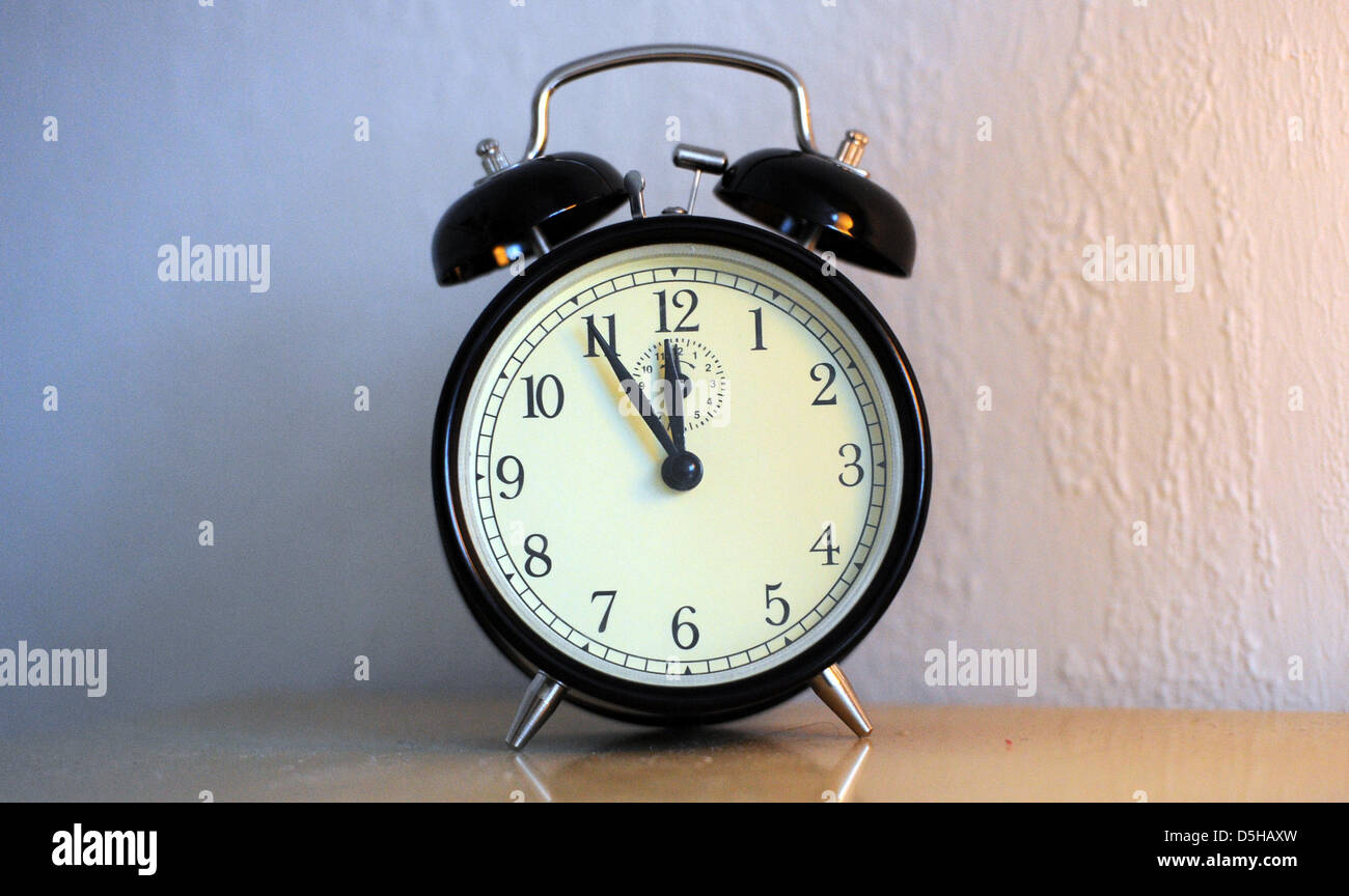 An alarm clock stands on a bedside table in Moers, Germany, 03 February ...