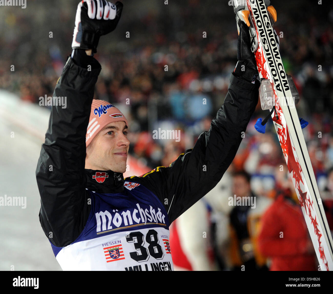 German Michael Neumayer celebrates his third place at the singles event ...