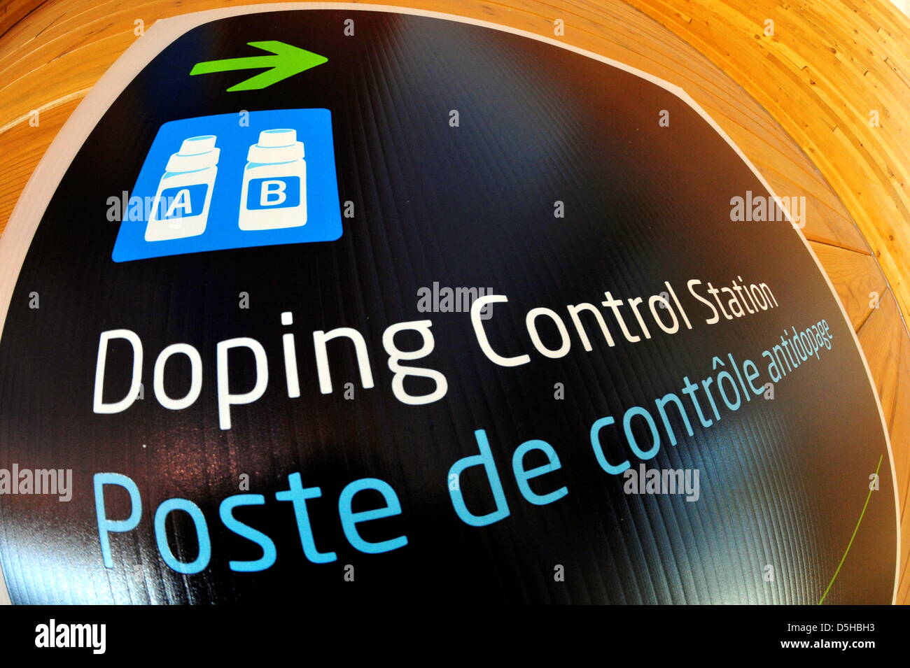 A sign indicates the way to a Doping Control Station at Vancouver ...