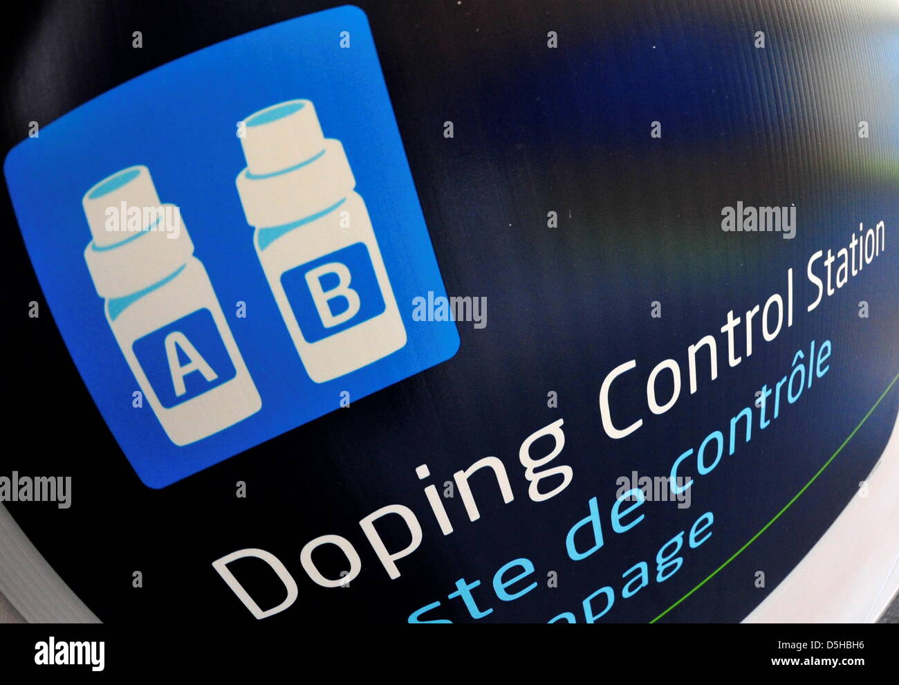 A sign indicates the way to a Doping Control Station at Vancouver ...