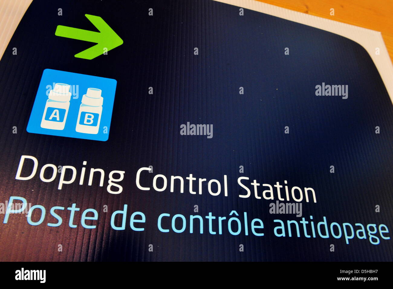 A sign indicates the way to a Doping Control Station at Vancouver ...