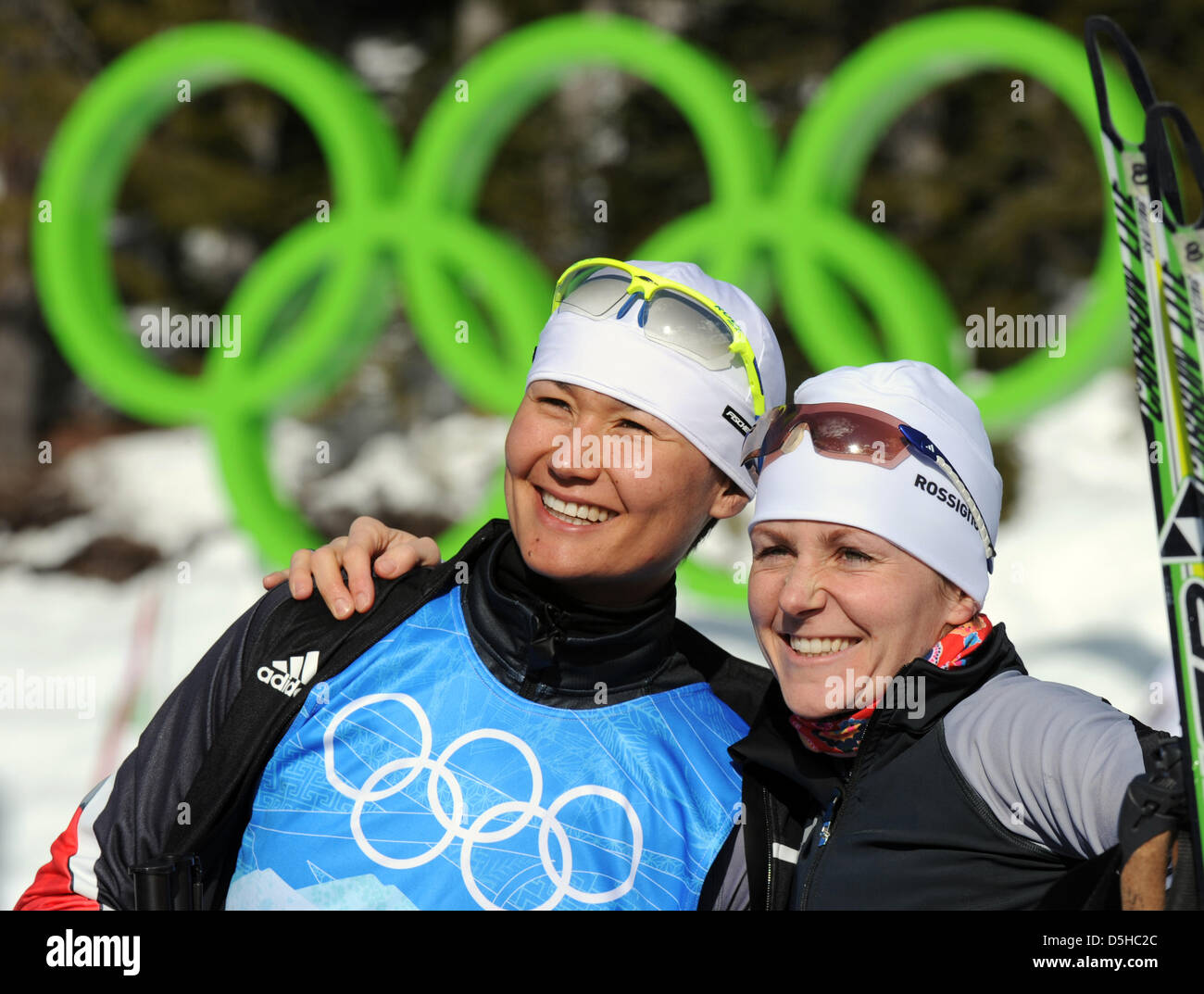 German Simone Hauswald (L) and team mate Martina Beck smile during the ...