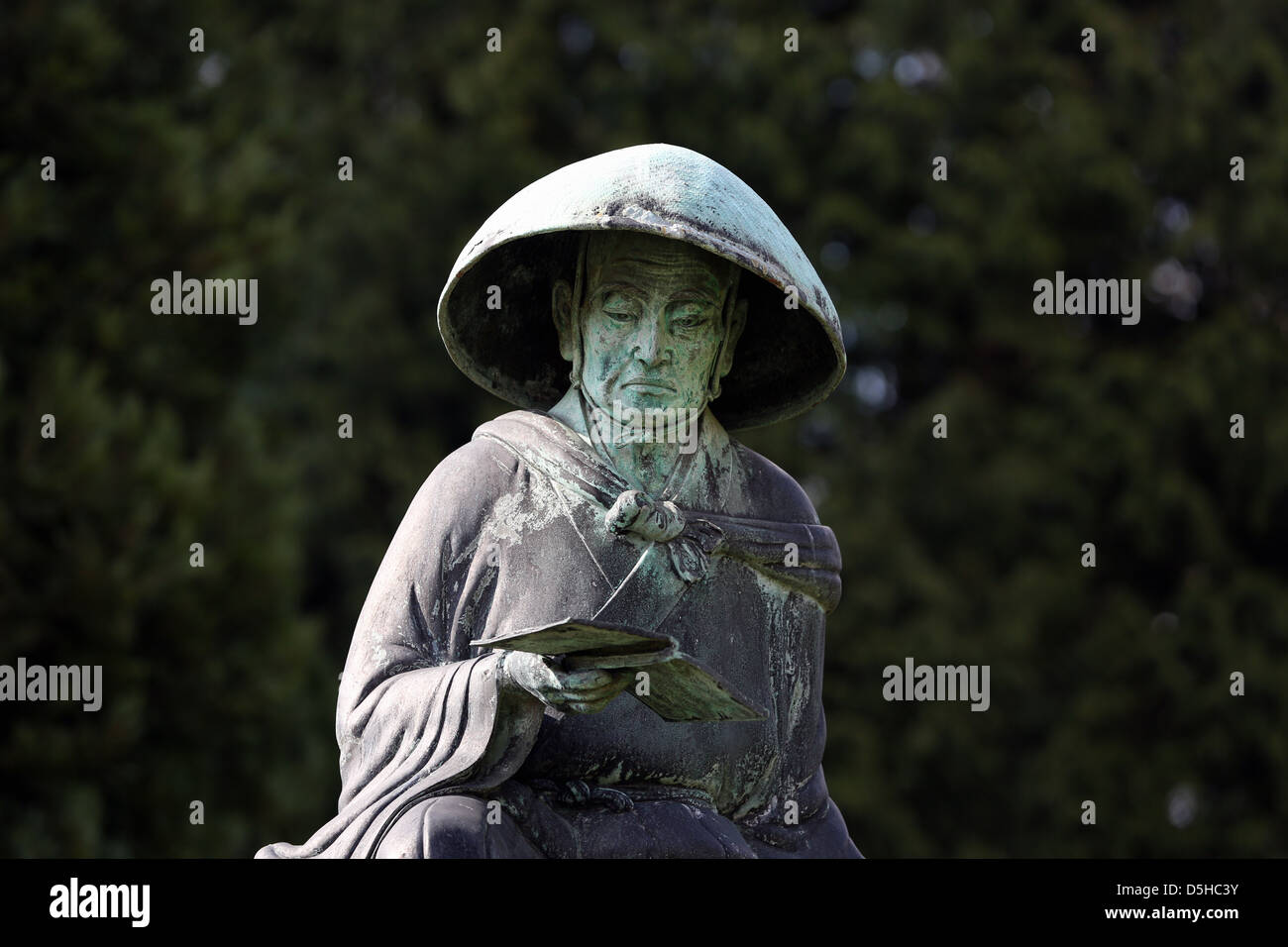 A bronze sculpture of Chinese philosopher, Lao-tse, riding side saddle ...