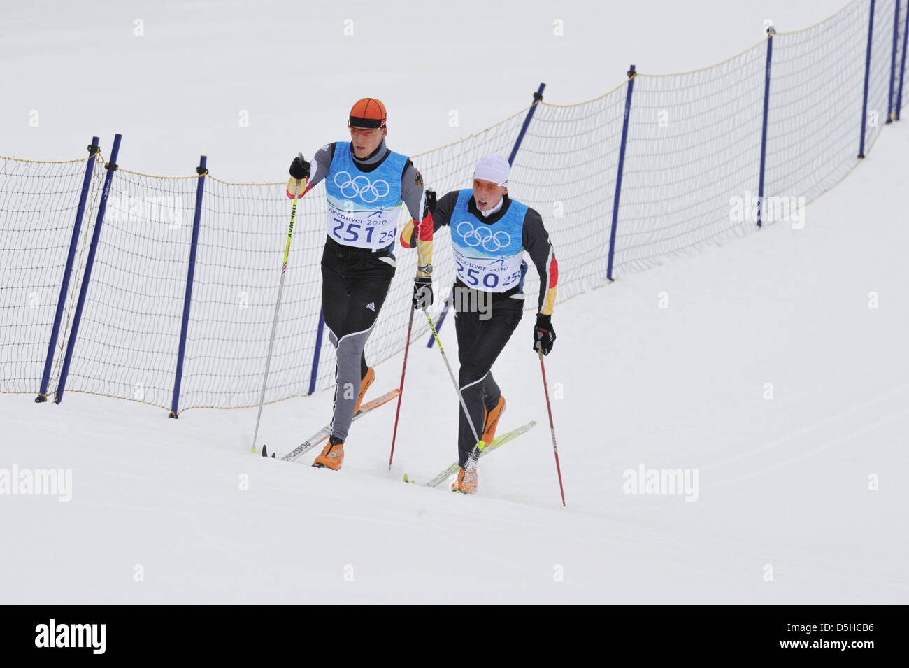 Tim Tscharnke (R) of Germany and team mate Jens Filbrich in action ...
