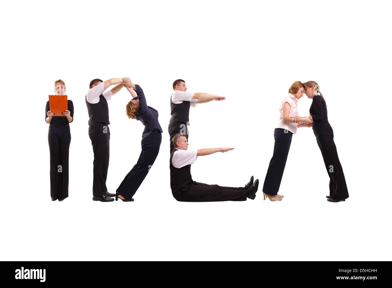 Young business people forming idea word over white Stock Photo - Alamy