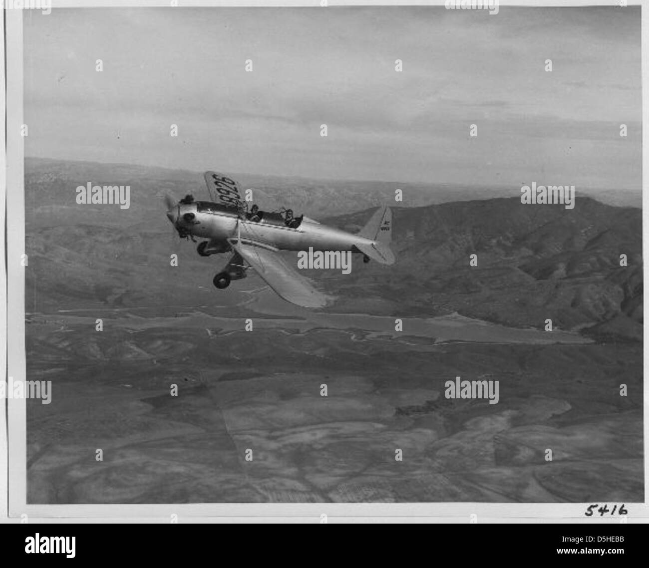 This image captures a pivotal moment in aviation history, showcasing a ...