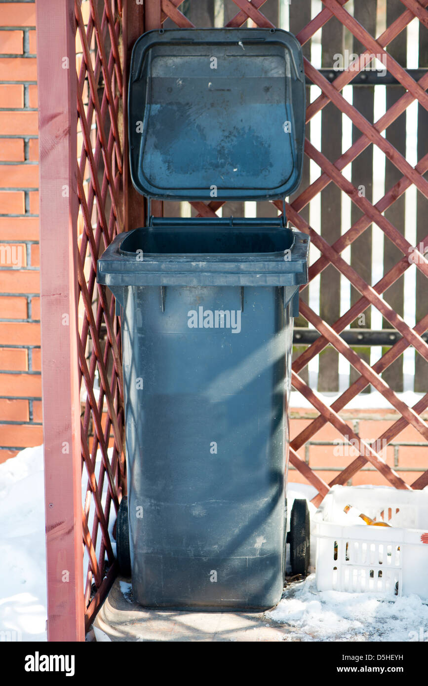 black dirt container for garbage Stock Photo - Alamy