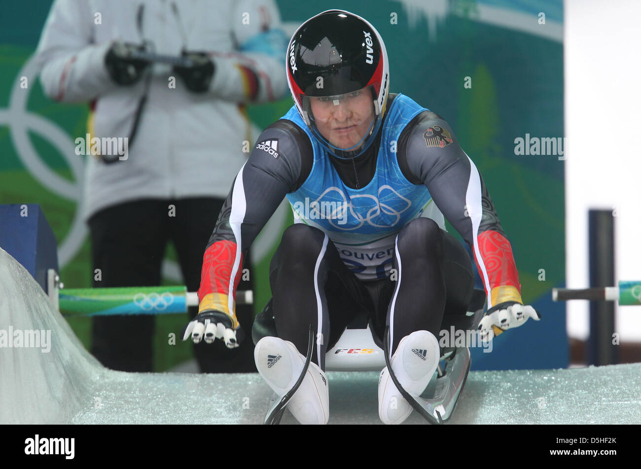 David Moeller of Germany starts during the first run of the menøs luge ...
