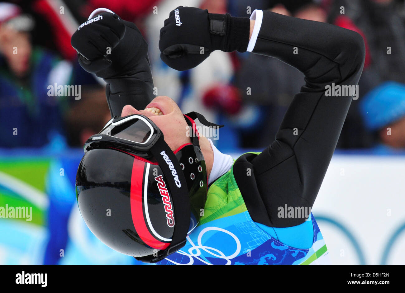 Simon Ammann of Switzerland celebrates after his final jump during the ...