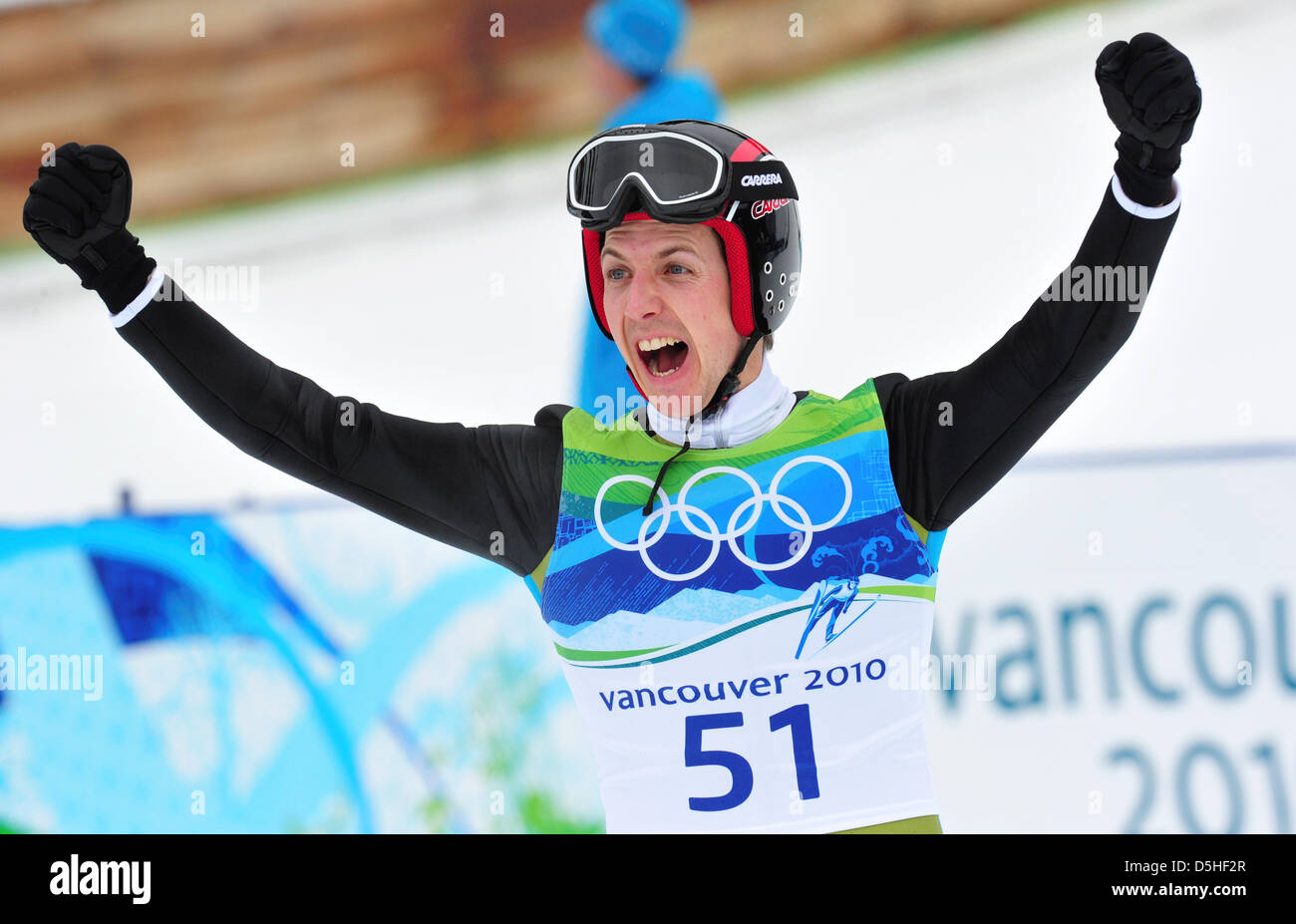 Simon Ammann of Switzerland celebrates after his final jump during the ...