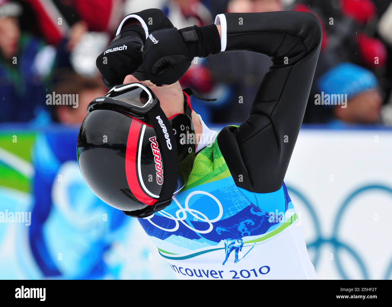 Simon Ammann of Switzerland celebrates after his final jump during the ...