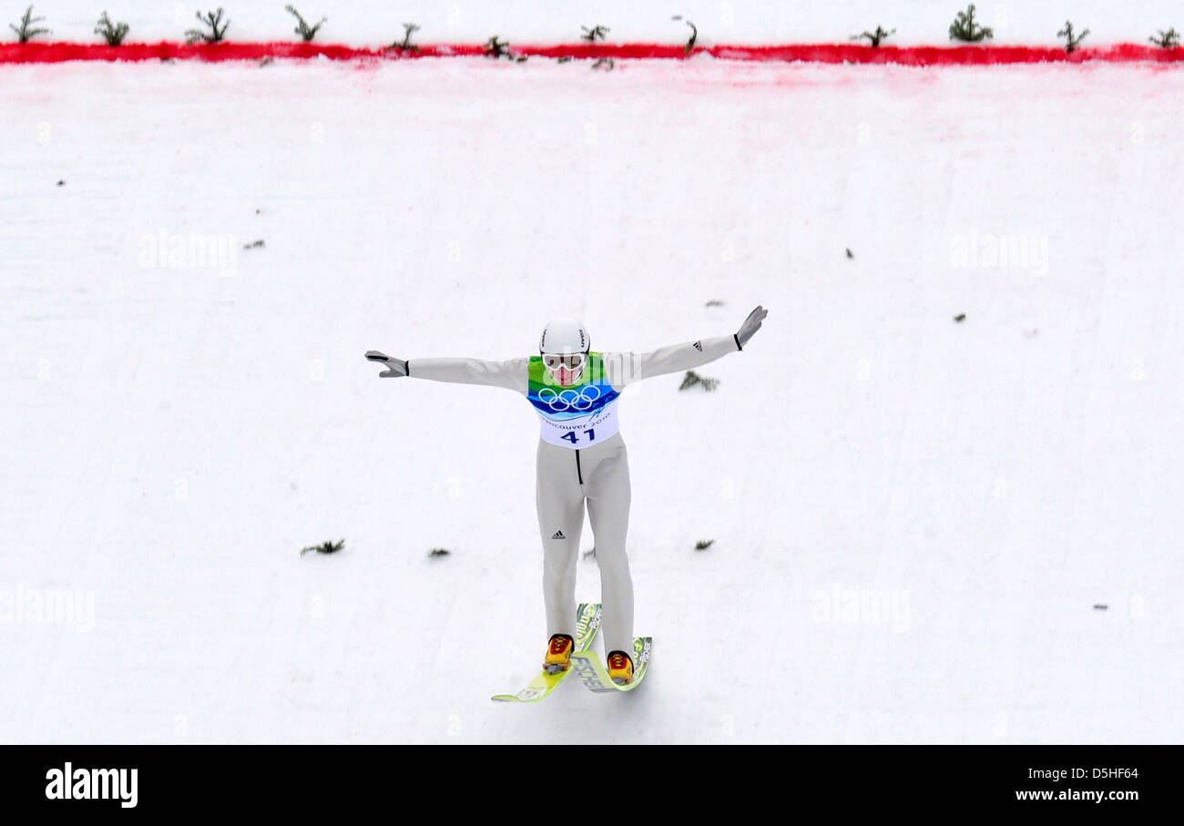 Michael Uhrmann of Germany in action during his first jump of the Ski ...