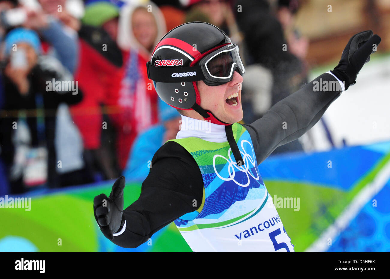 Simon Ammann of Switzerland celebrates after his final jump during the ...