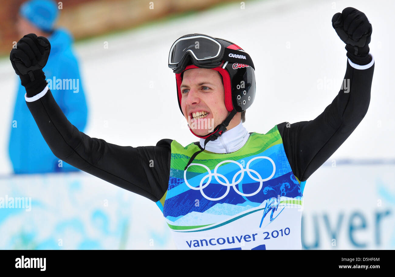 Simon Ammann of Switzerland celebrates after his final jump during the ...