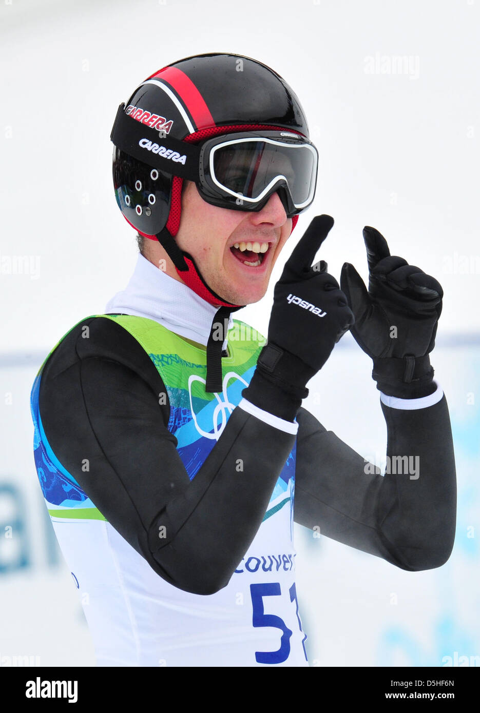 Simon Ammann of Switzerland celebrates after his final jump during the ...