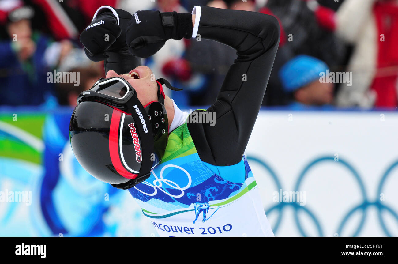 Simon Ammann of Switzerland celebrates after his final jump during the ...