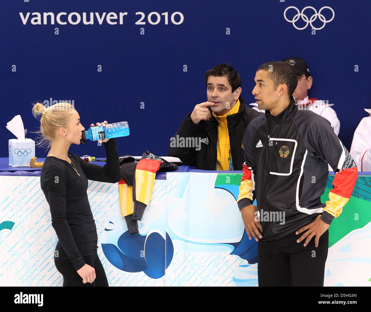 Pair skater Aliona Savchenko and Robin Szolkowy of Germany talks to ...