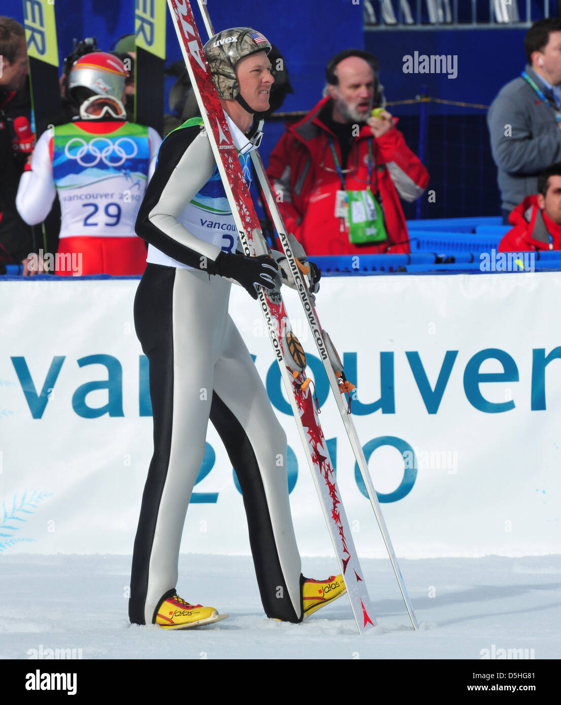 Todd Lodwick reacts after his first jump in the Ski Jumping portion of ...