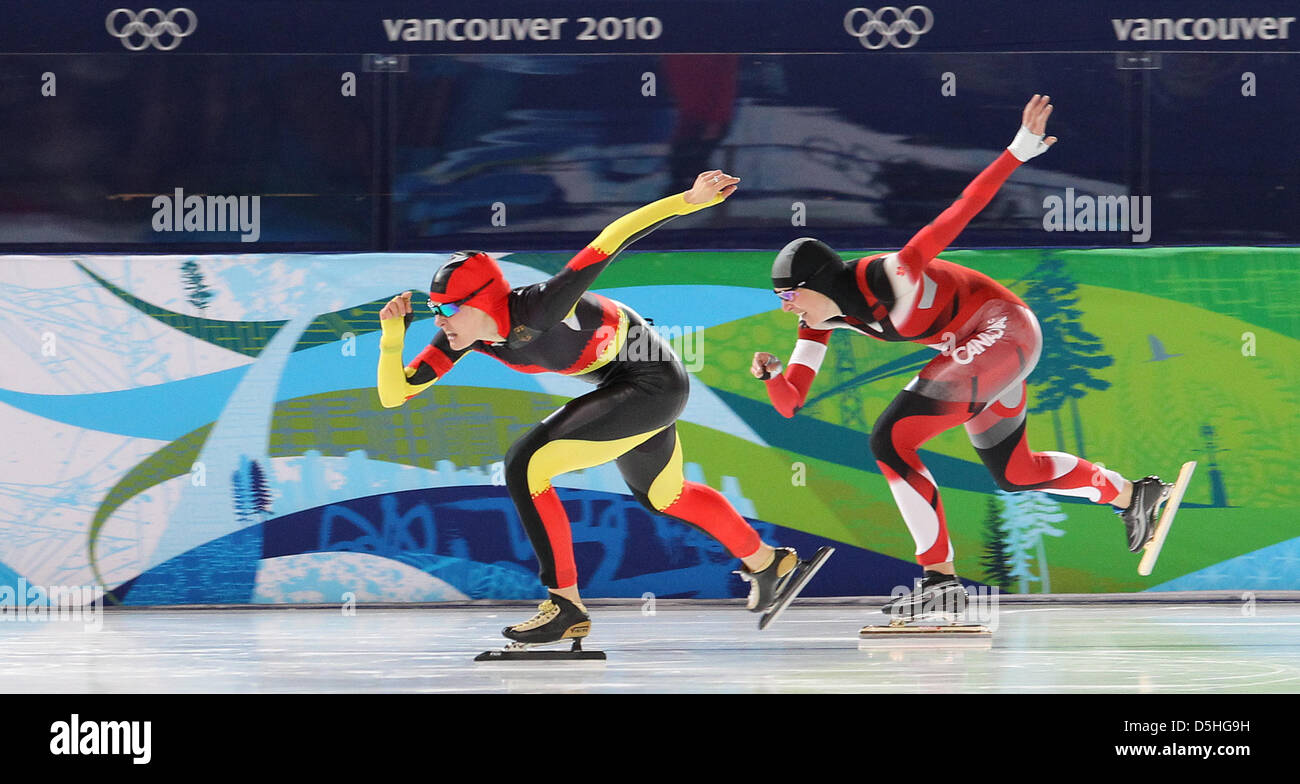 Stephanie Beckert (L) of Germany and Kristina Groves of Canada compete ...
