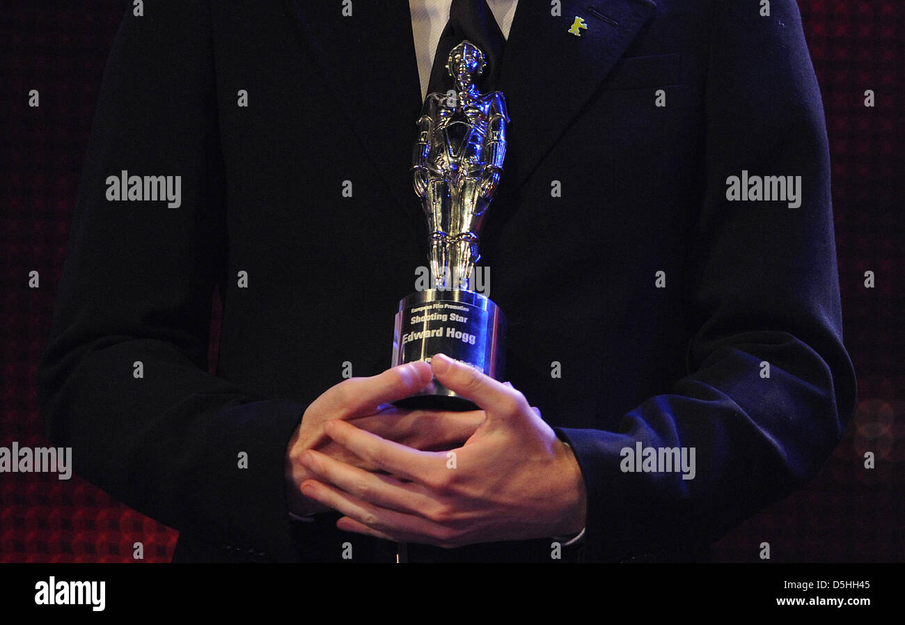 Edward Hogg (United Kingdom) holds his Shooting Star trophy 2010 during ...