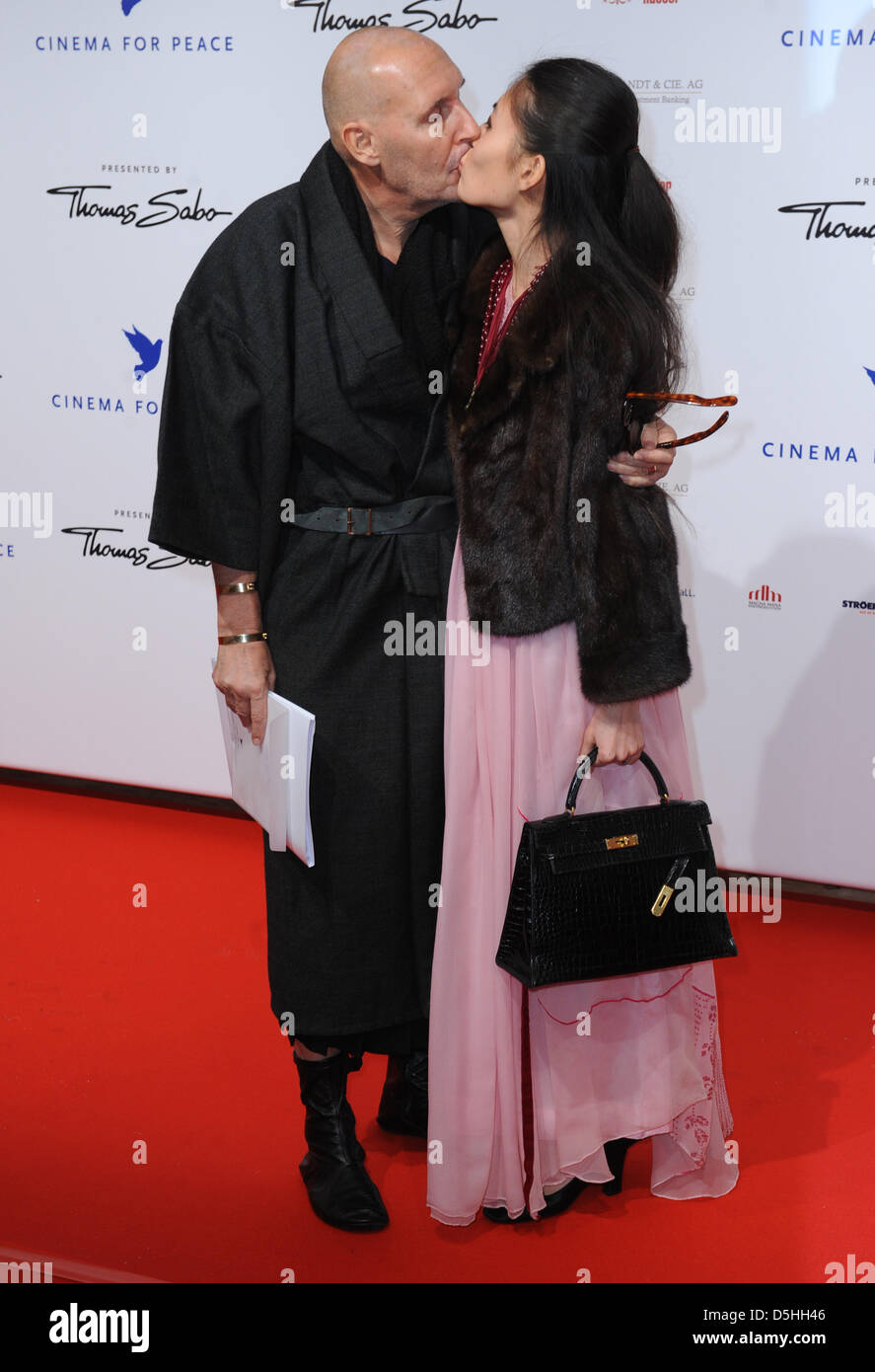 French photographer Michel Comte and his wife Ayako arrive for the ...
