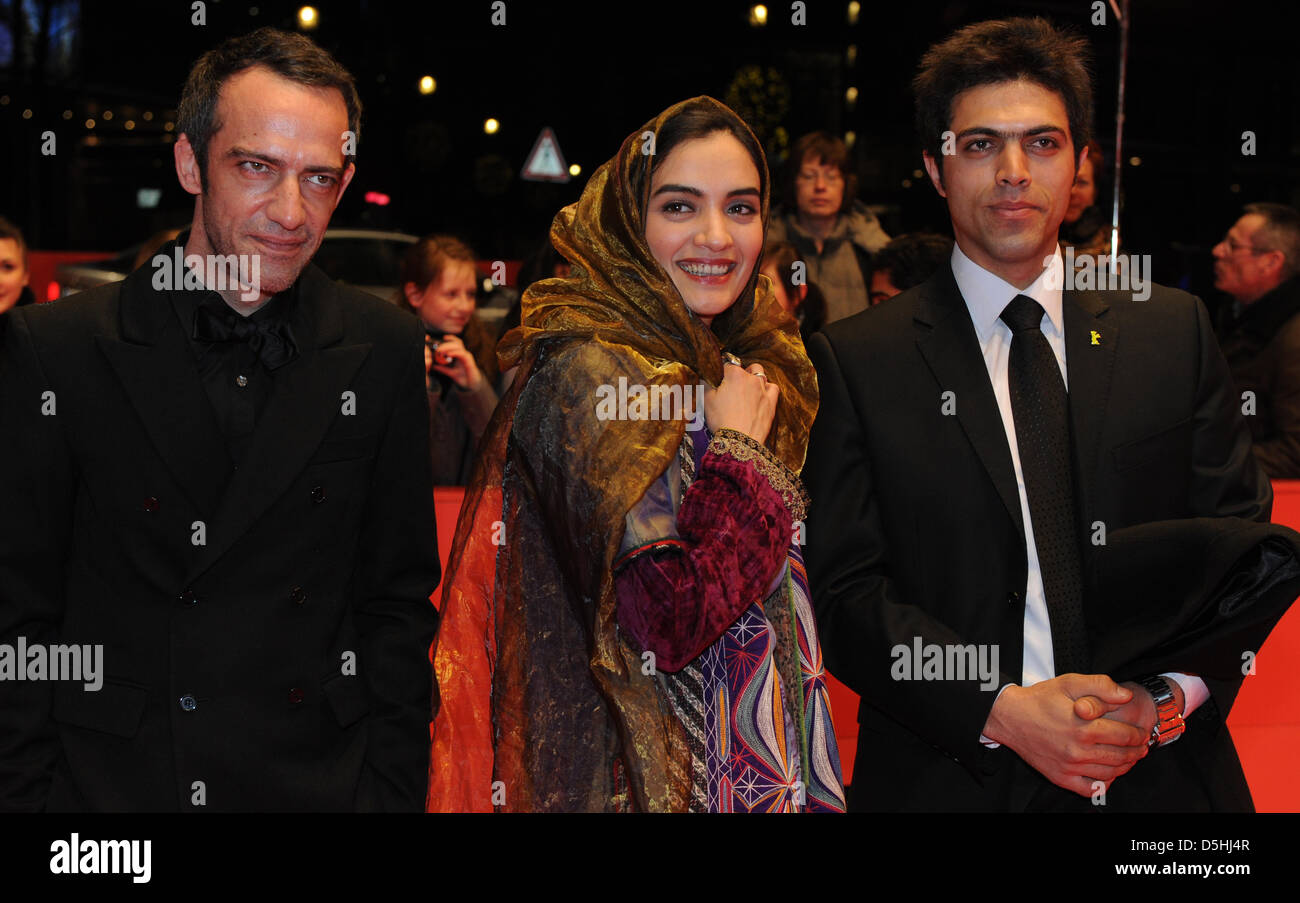 Iranian director Rafi Pitts (L), Iranian actress Mitra Hajjar and Hassan Ghal'e Noui arrive for ...