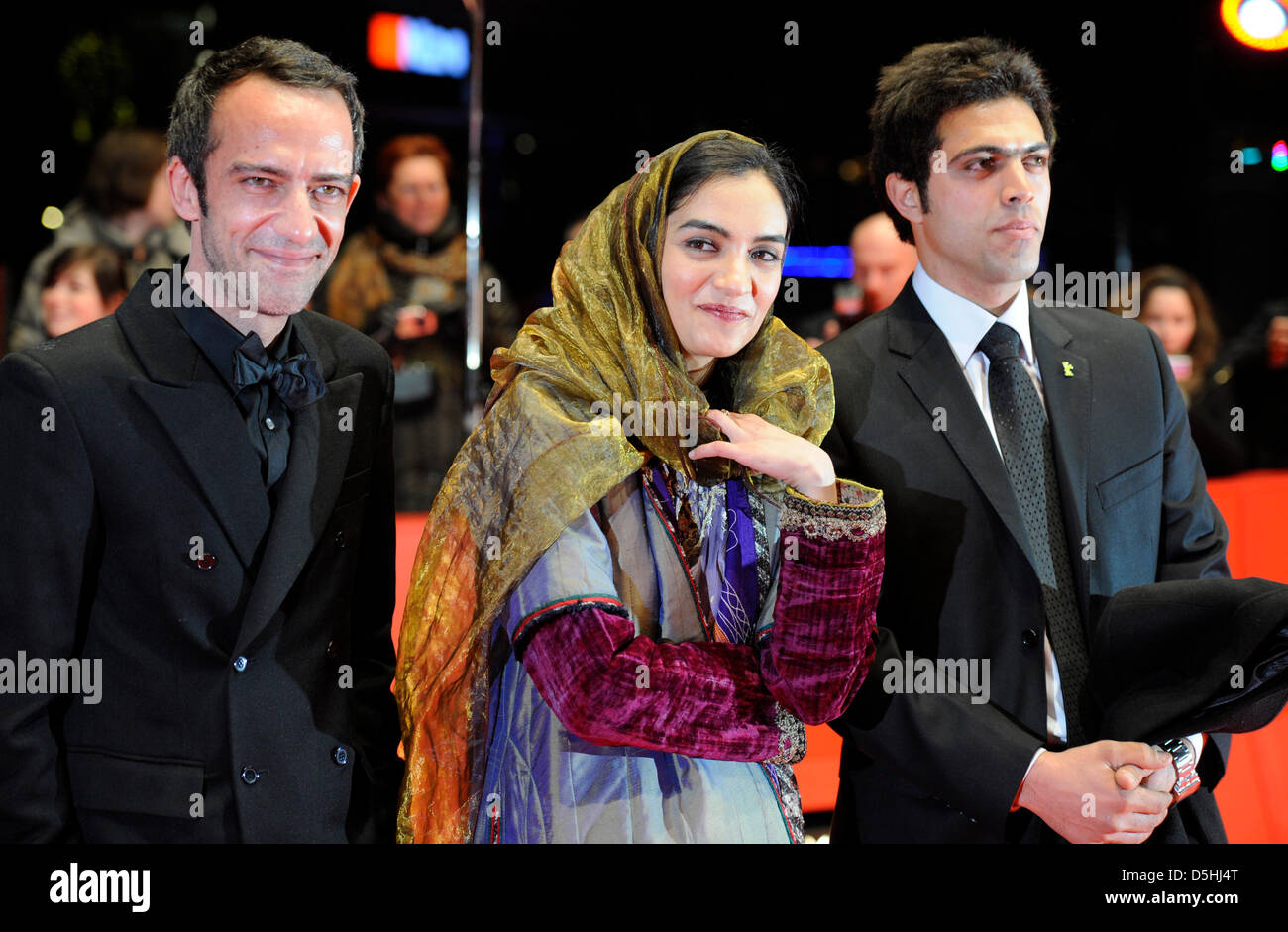 Iranian director Rafi Pitts (L), Iranian actress Mitra Hajjar and Hassan Ghal'e Noui arrive for ...