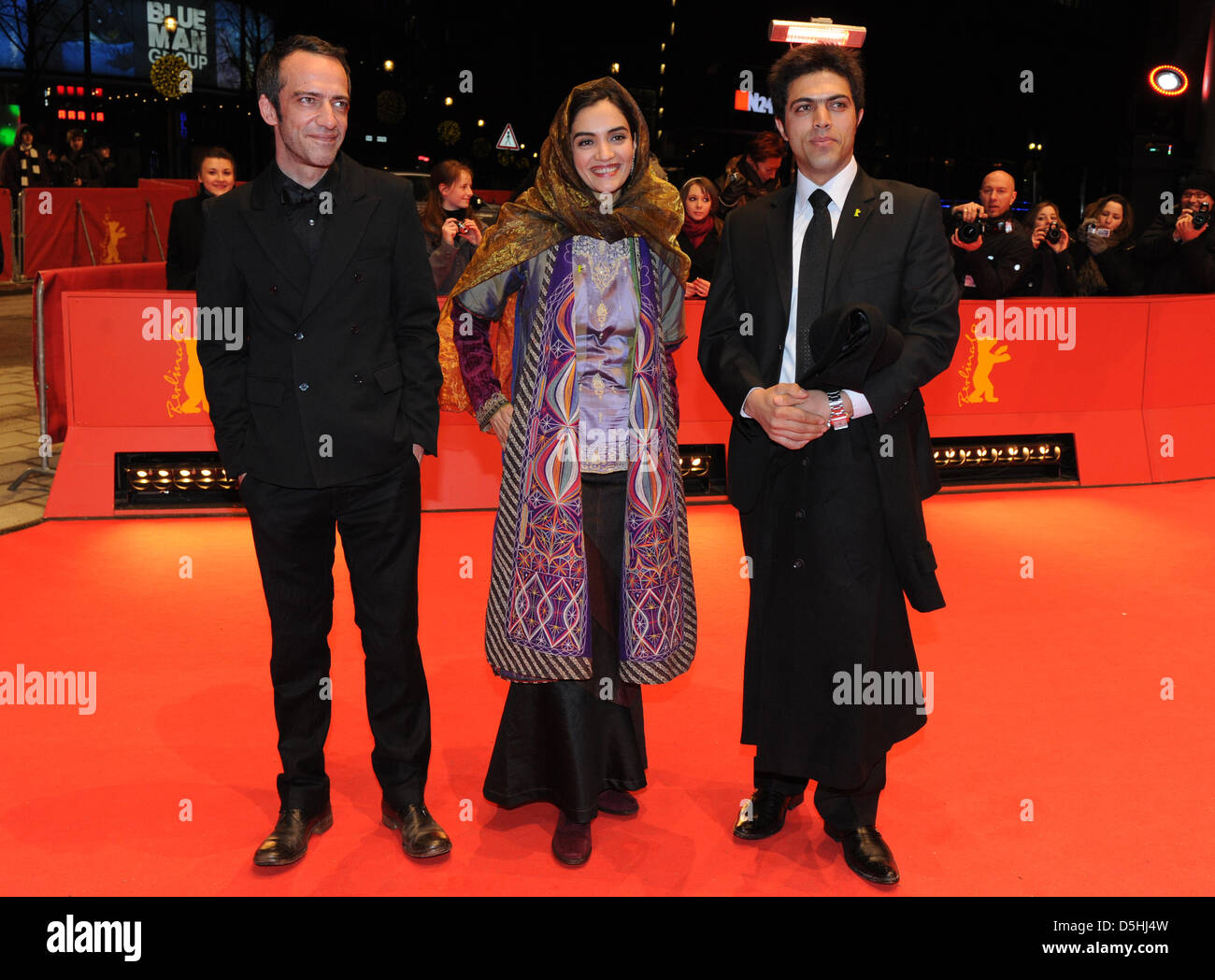 Iranian director Rafi Pitts (L), Iranian actress Mitra Hajjar and Hassan Ghal'e Noui arrive for ...