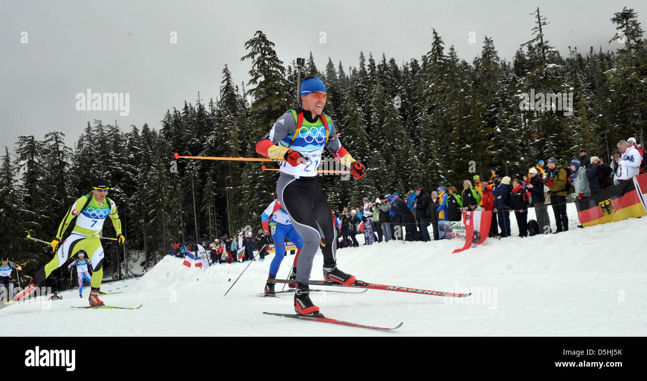 Michael Greis (C) of Germany in action during the Biathlon men's 12,5 ...