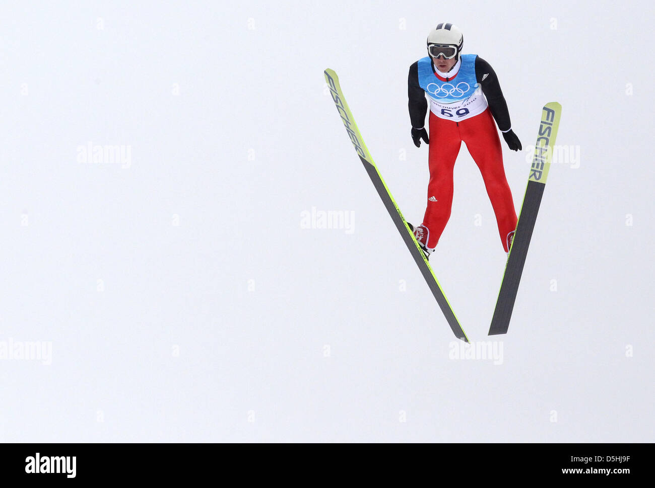 Simon Ammann of Switzerland jumps during the official Ski jumping ...