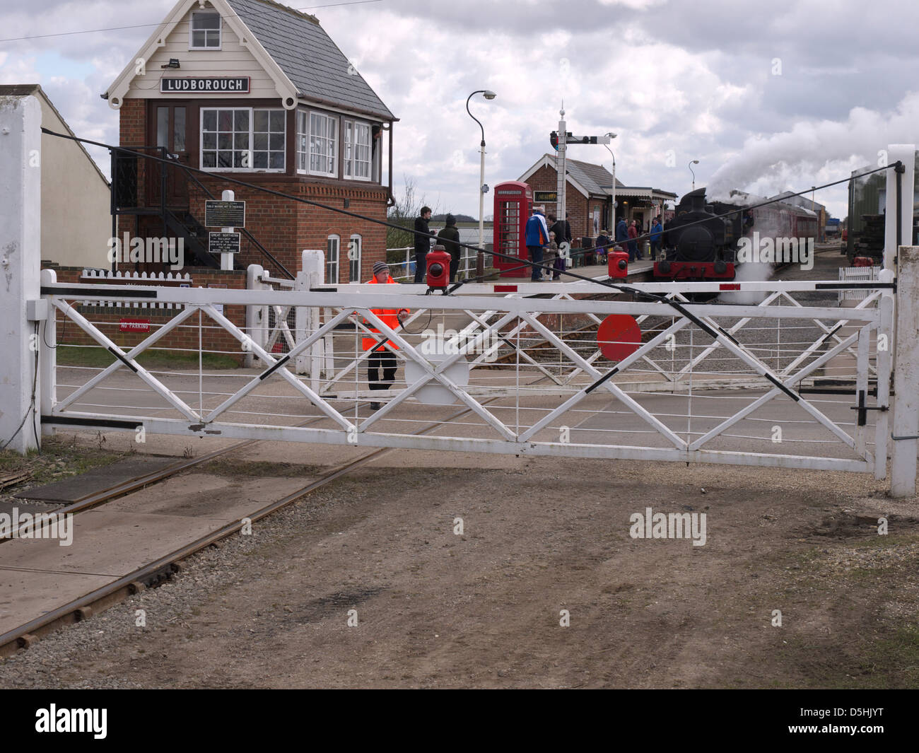 Steam Loco waiting for the Ludborough crossing gates to open to journey ...