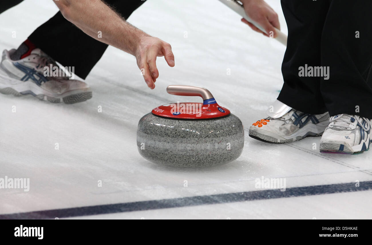 Player of Germany releases the stone during Curling men's round robin ...