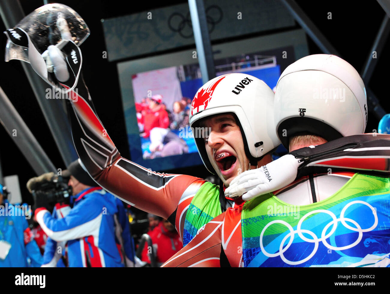 Chris (R) and Mike Moffat of Canada celebrate in the finish area during ...