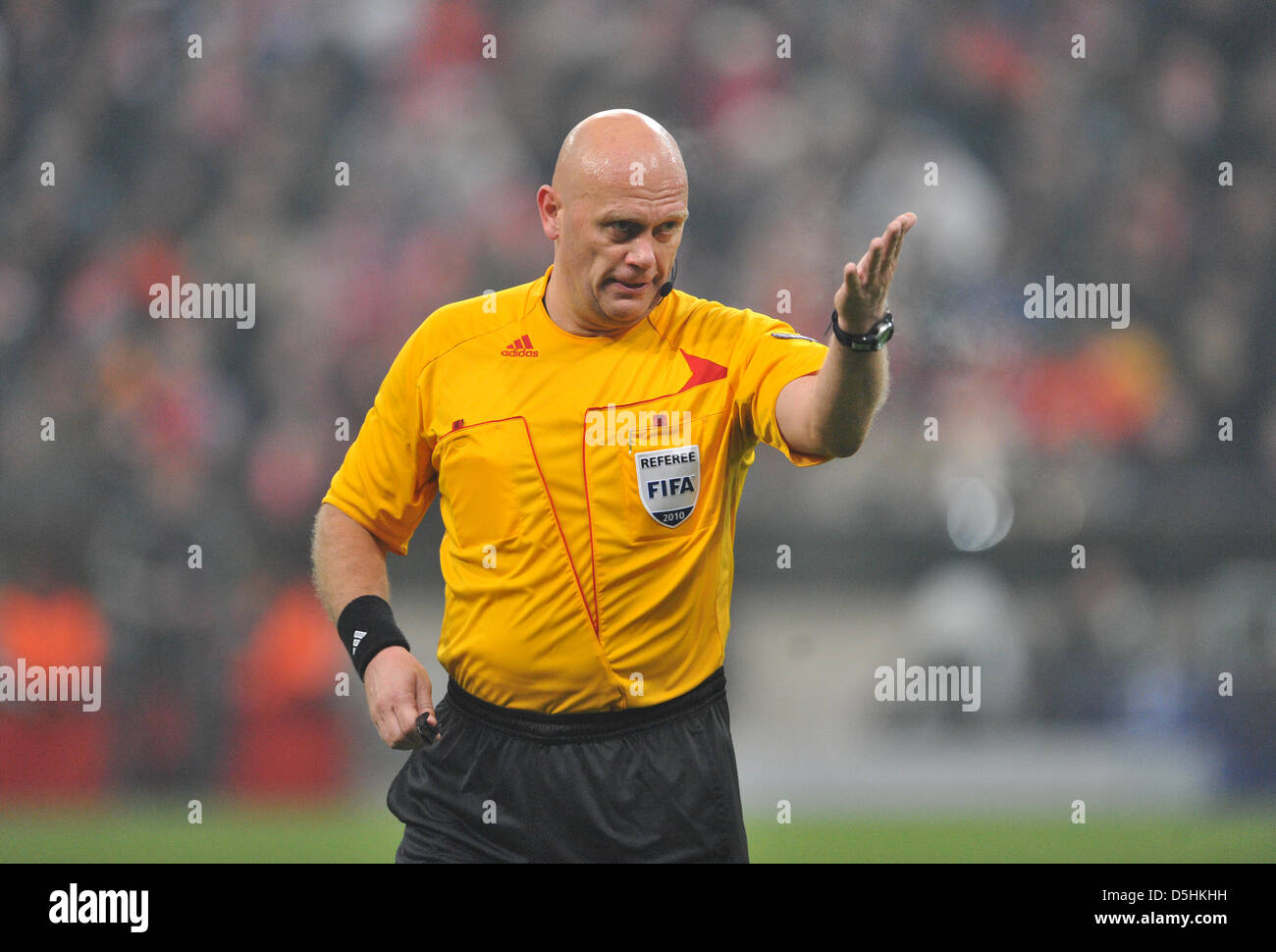 Norwegian referee Tom Henning Ovrebo gestures during the Champions ...