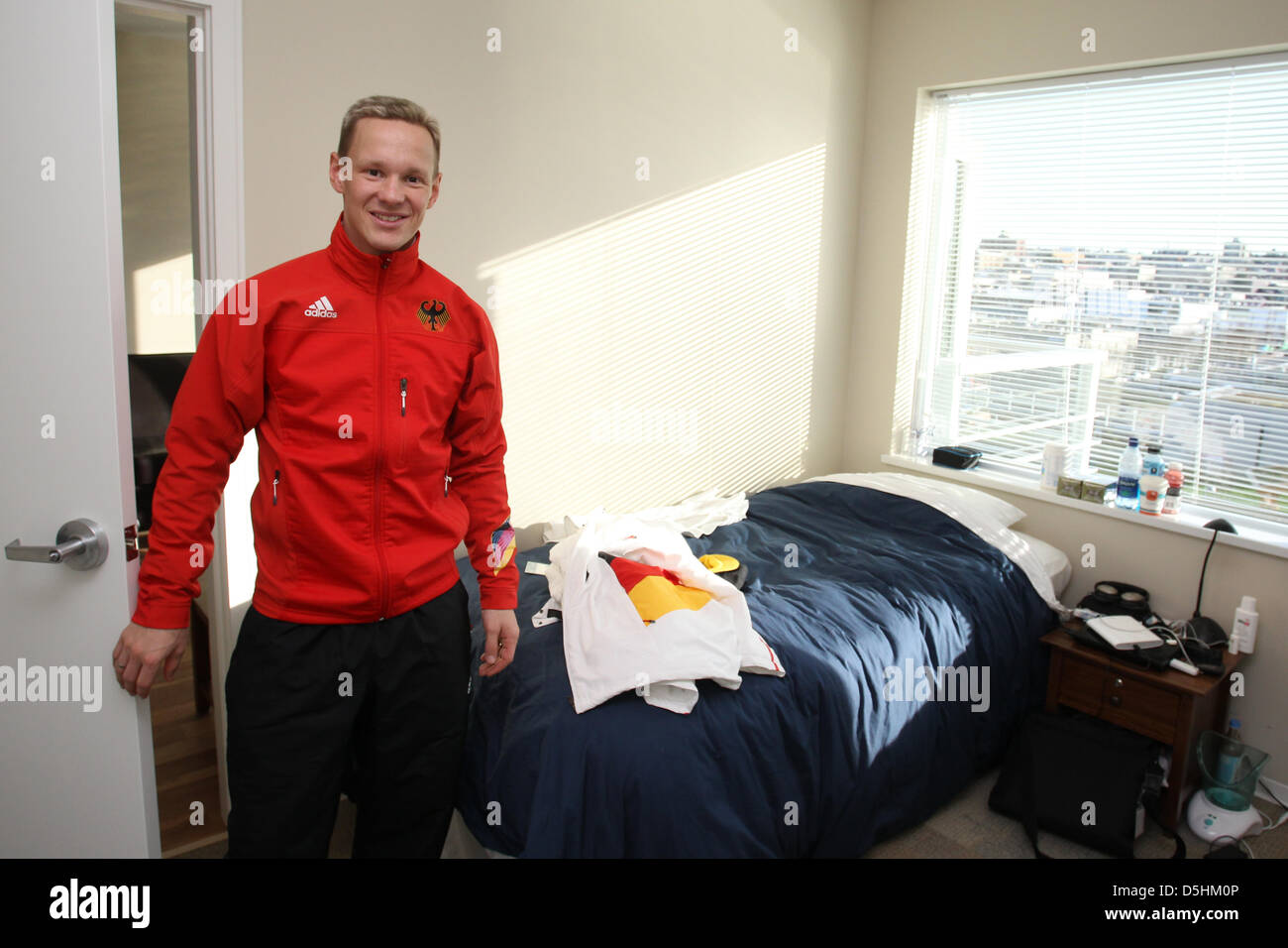 German speed skater Marco Weber smiles in his room in the Olympic ...