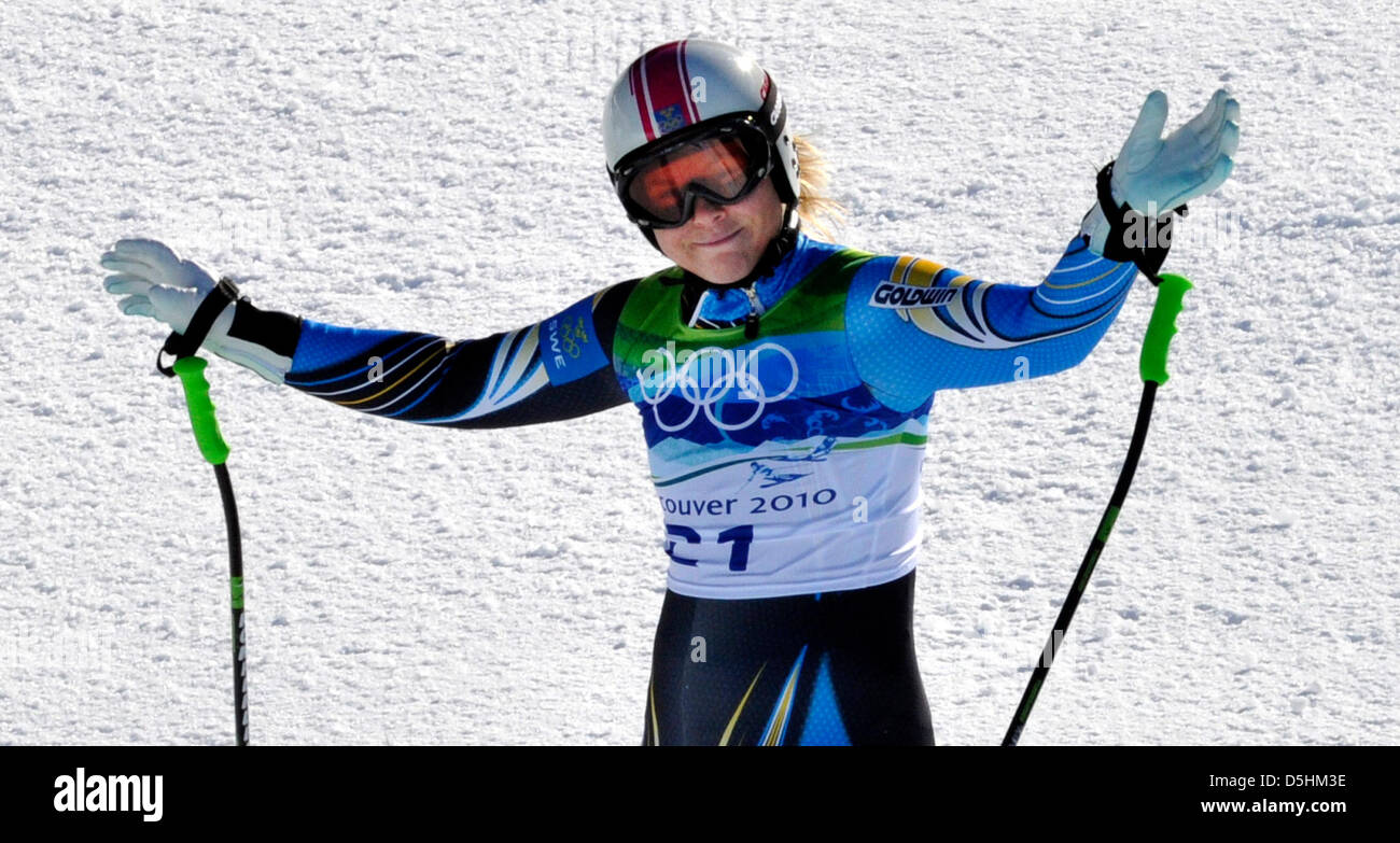 Anja Paerson of Sweden reacts in the finish area during the Downhill ...