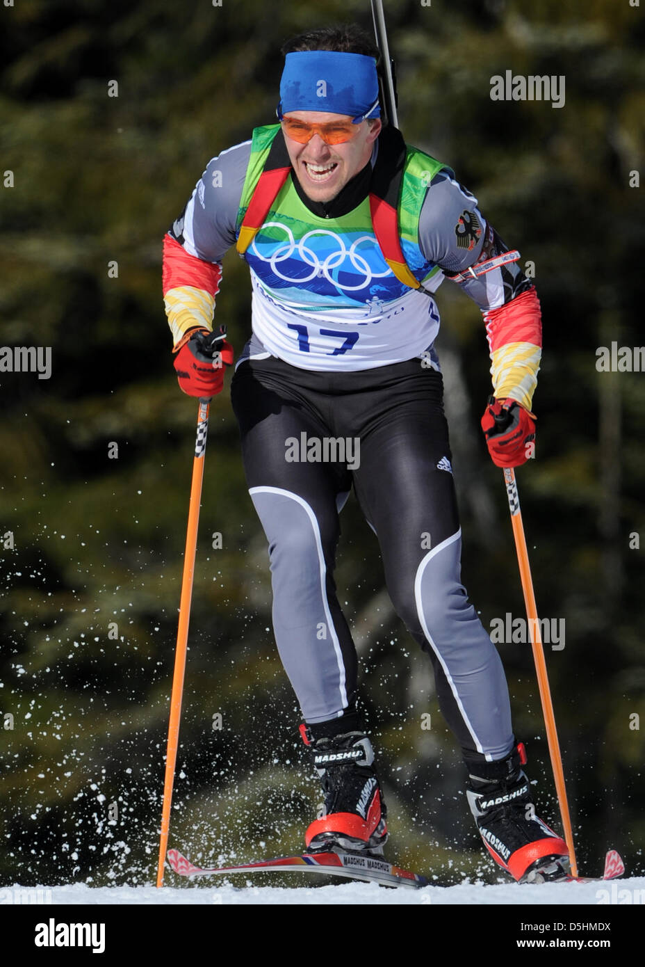 Michael Greis of Germany in action during the Biathlon men's 20 km ...