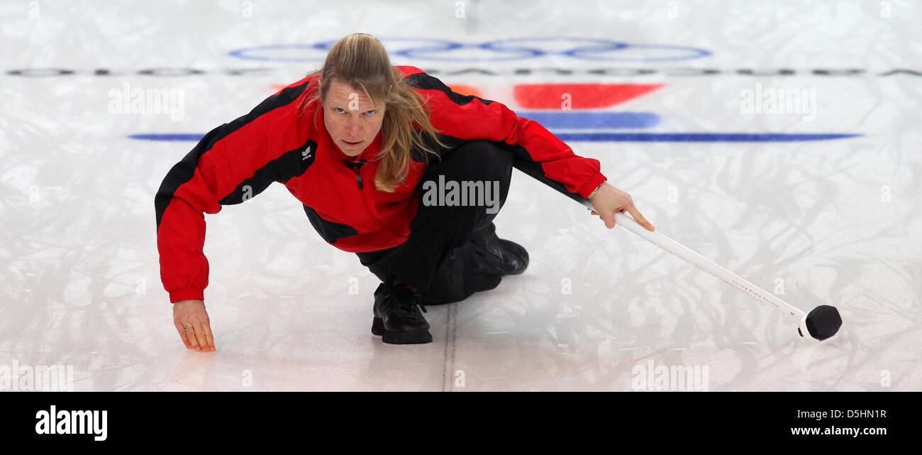 Skip Andrea Schoepp of team Germany eyes the stone during curling women ...