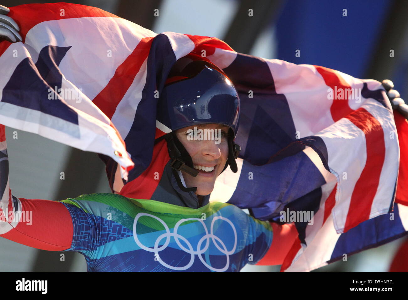 Winner Amy Williams of Great Britain celebrates during the flower ...