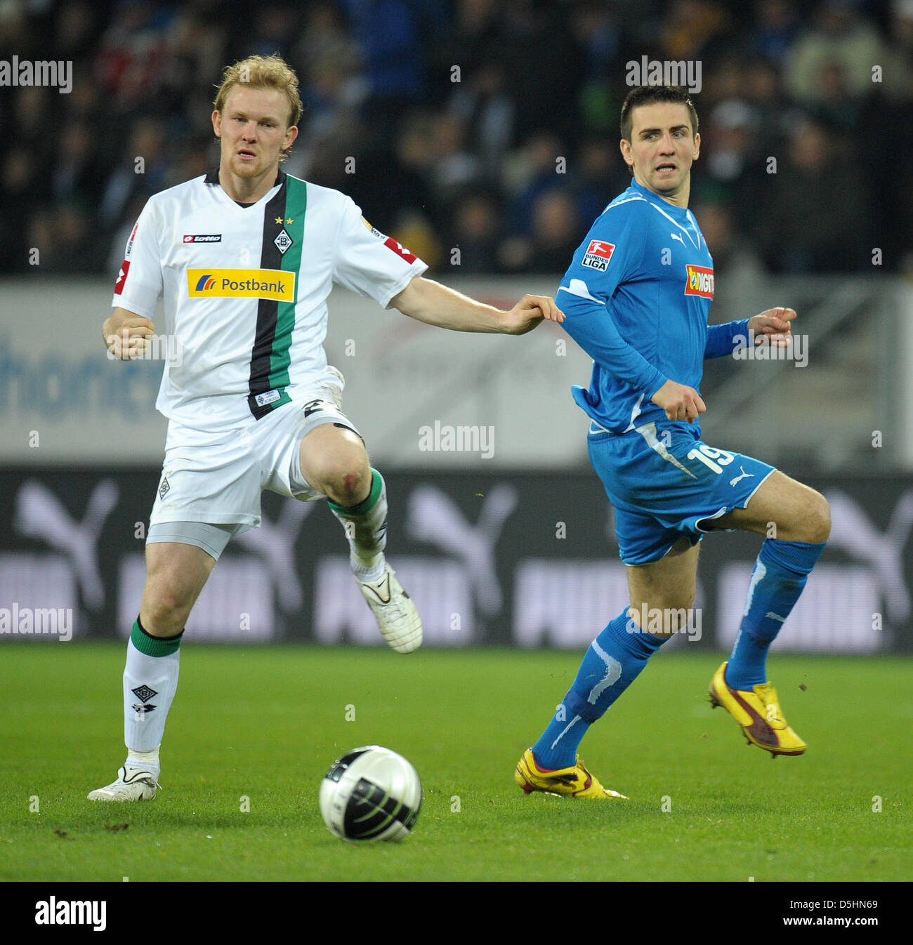 Hoffenheim's Vedad Ibisevic (R) and Moenchengladbach's Tobias Levels (L ...