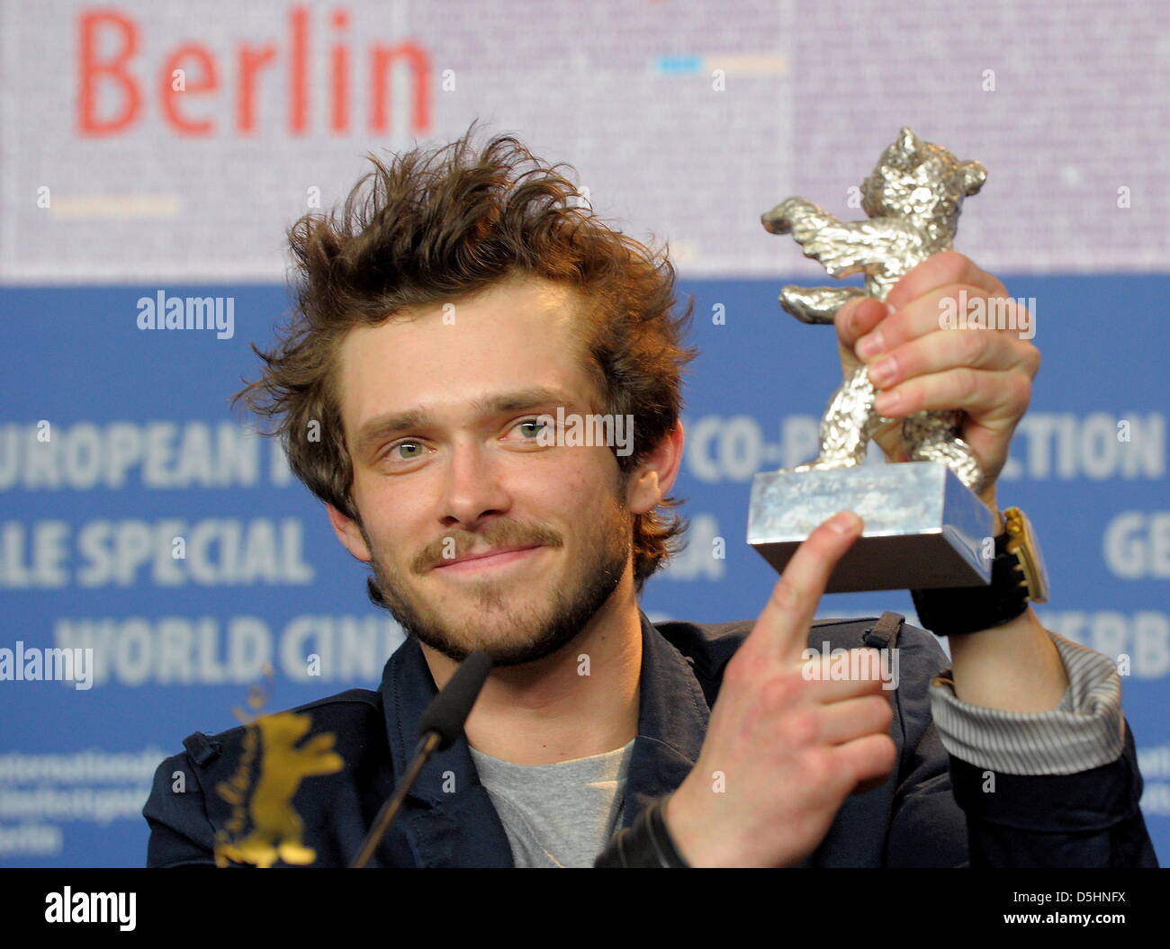 Russian actor Grigory Dobrygin poses with the Award for Best Actor ...